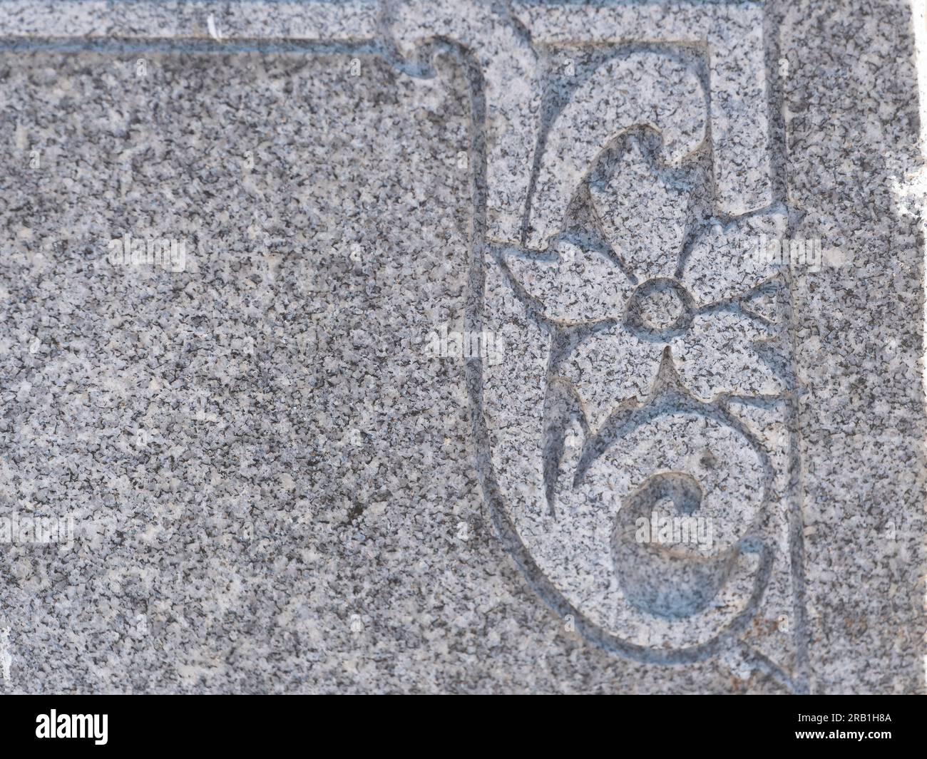 Engravings on grave stone Stock Photo - Alamy