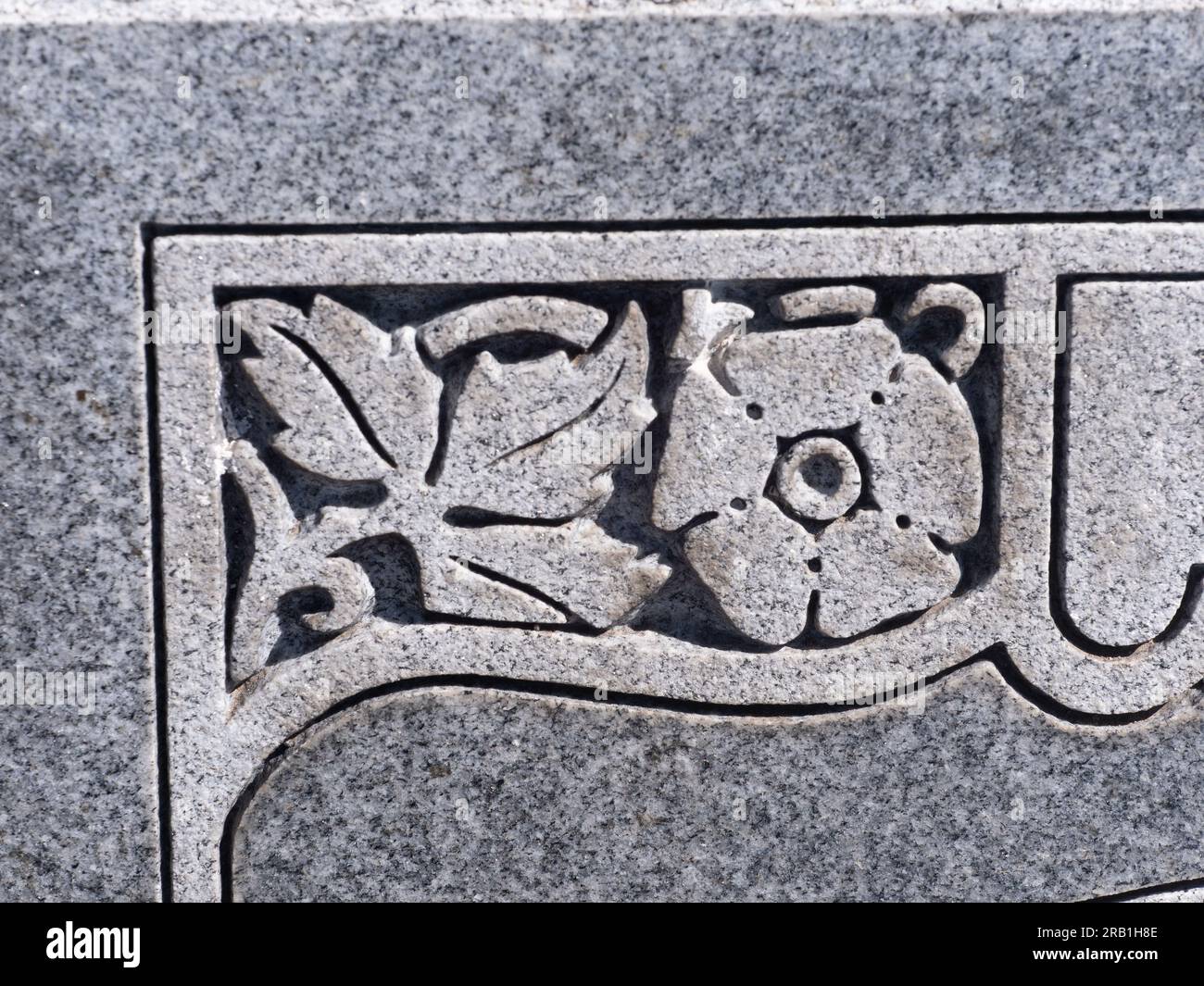 Engravings on grave stone Stock Photo - Alamy