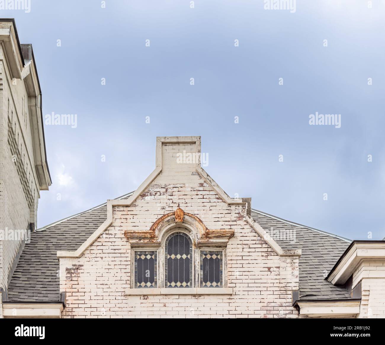 detail image of a attic window on the midtown fellowship church on 12th ...