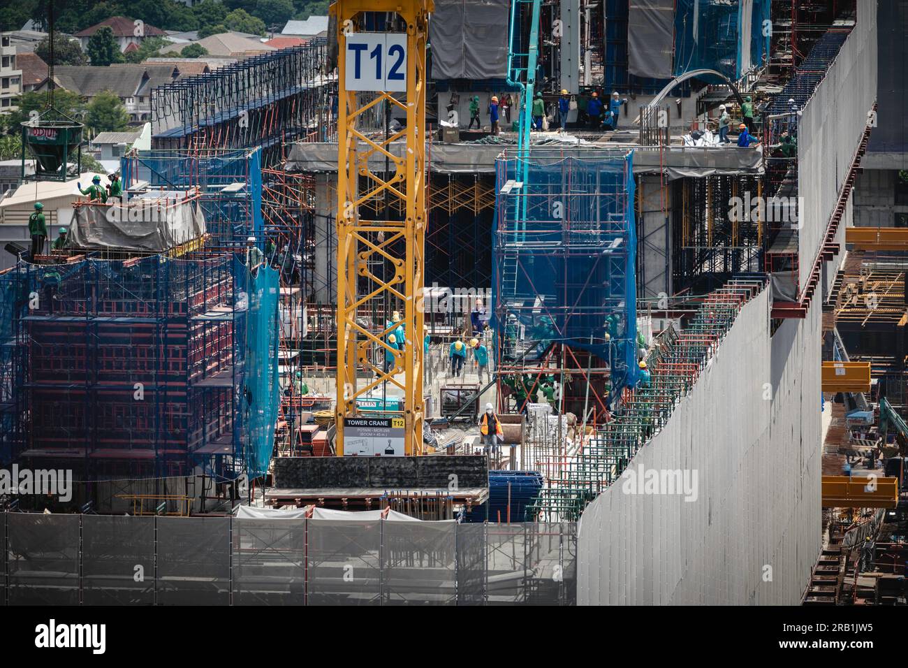 Construction workers are seen on the site of 11 Cloud Project under construction by the main ...