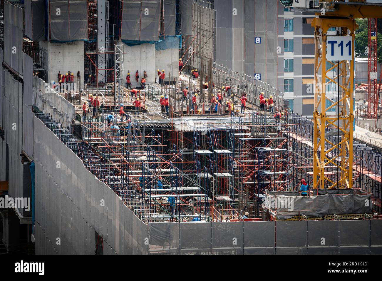 Construction workers are seen working on the site of 11 Cloud Project under construction, which ...