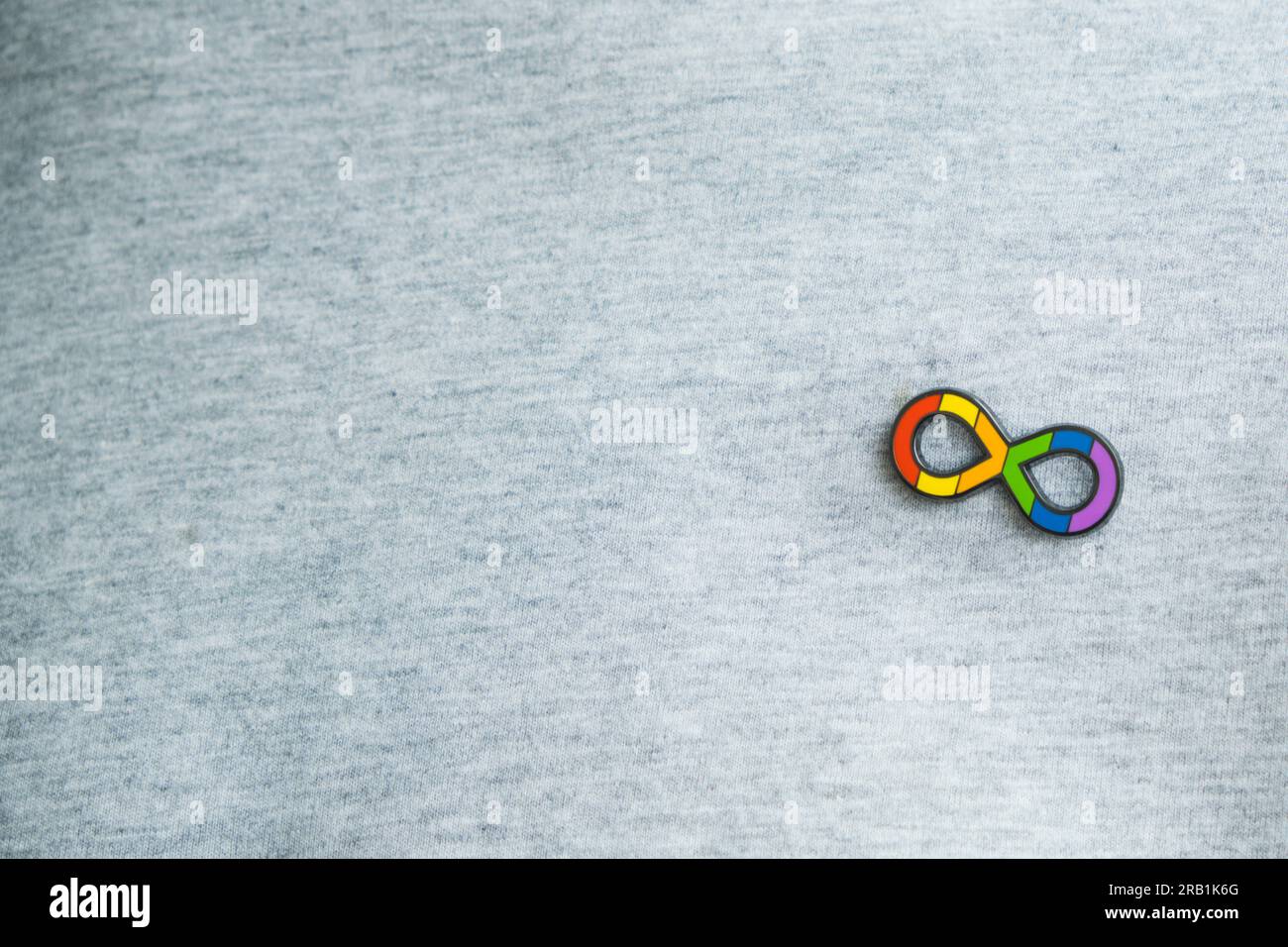 Teenage boy with autism infinity rainbow symbol sign metallic pin ...