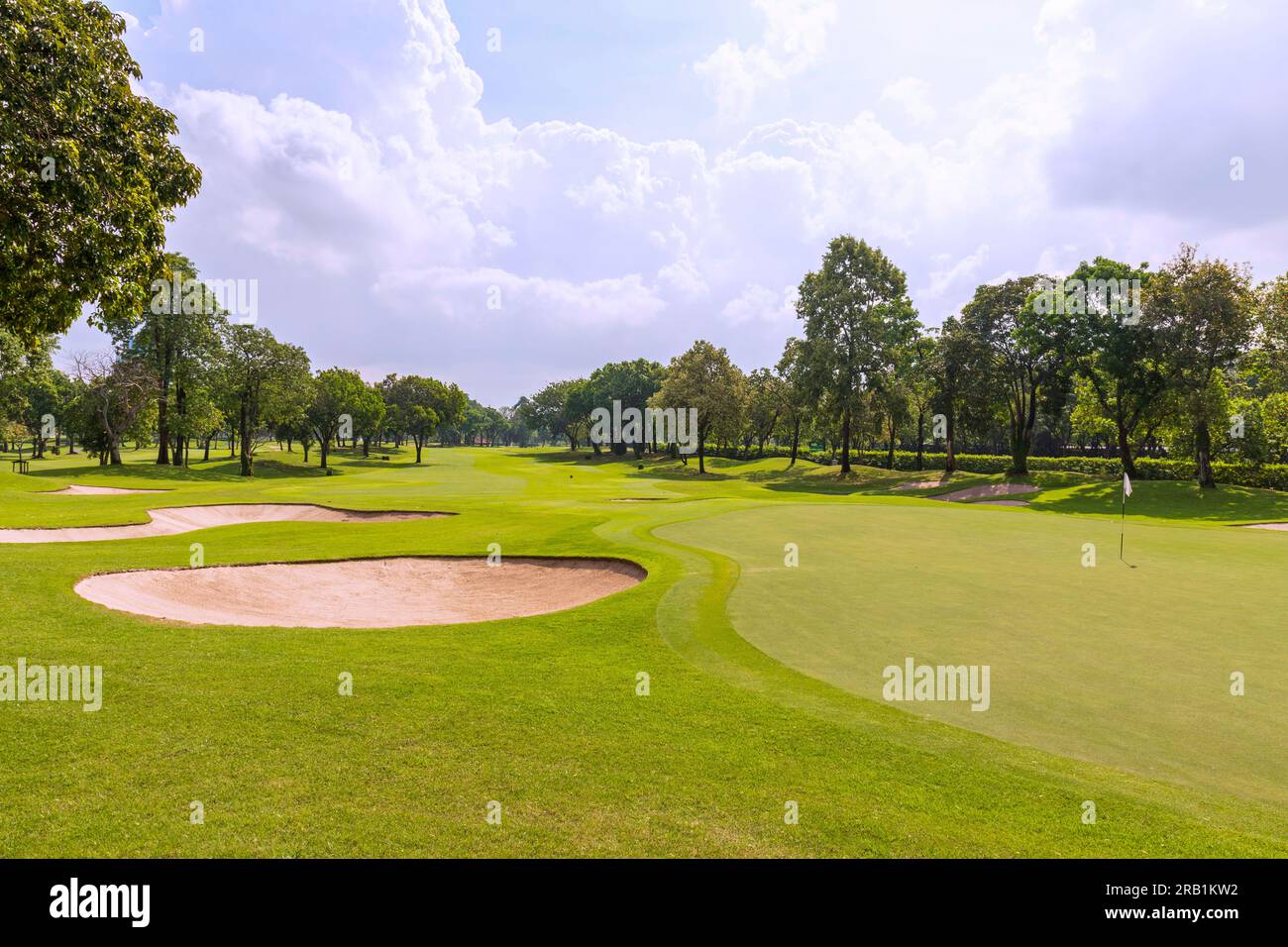View of a golf course in Thailand with lush green grass, beautiful ...