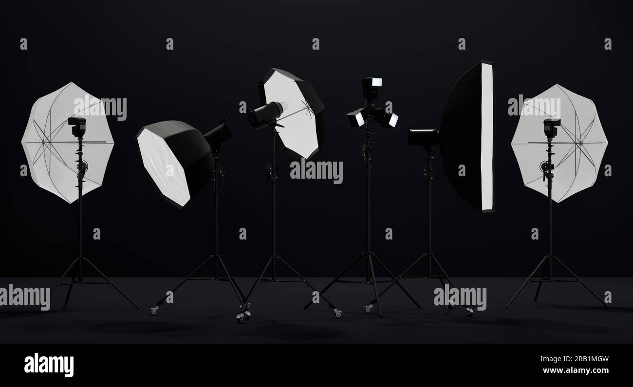 Photography studio flash on a lighting stand isolated on black ...