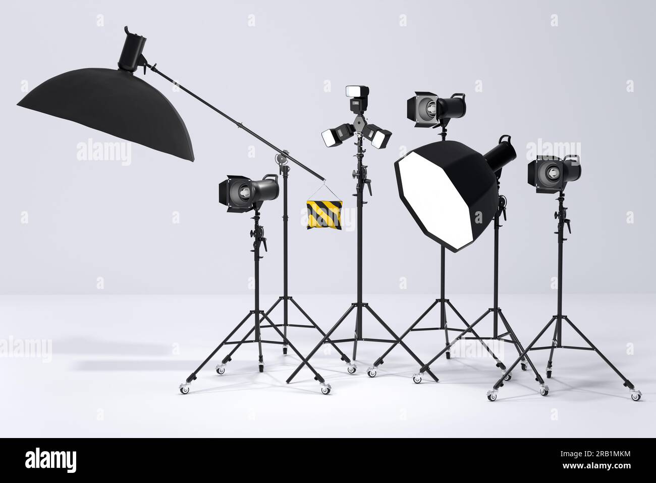 Photography studio flash on a lighting stand isolated on white ...