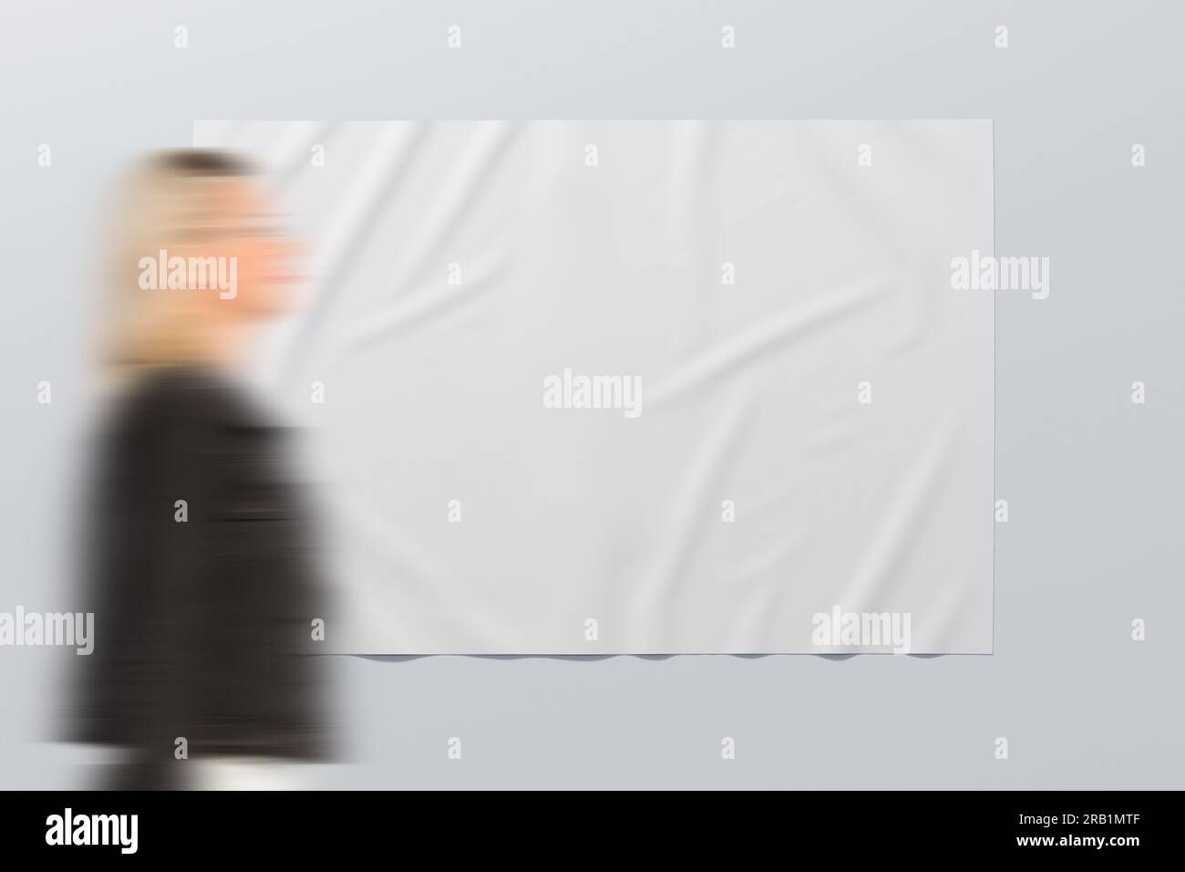 Blank horizontal wrinkled street poster on white wall. With clipping ...
