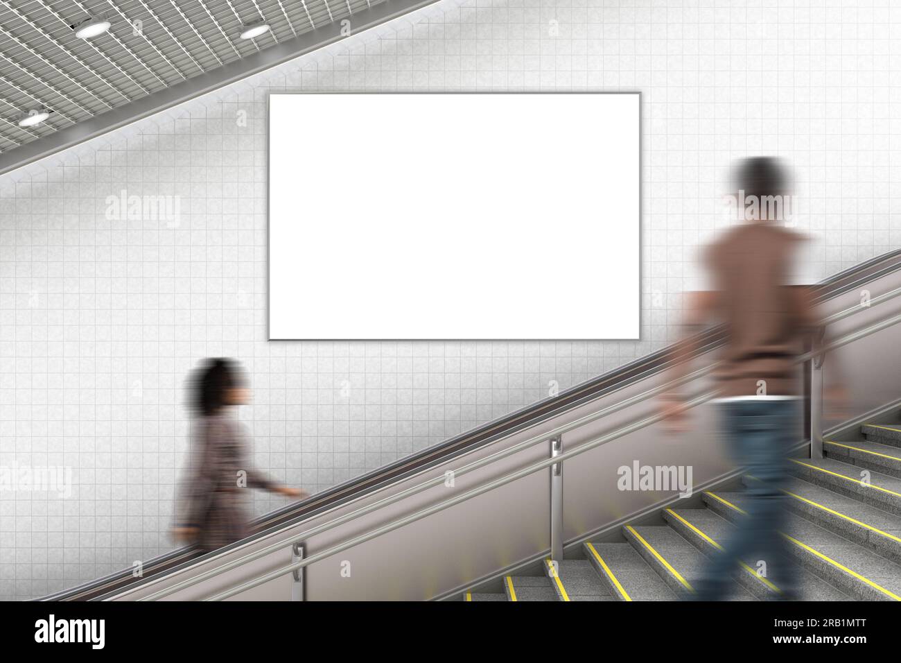 Blank horizontal advertising poster on wall of underground escalator ...