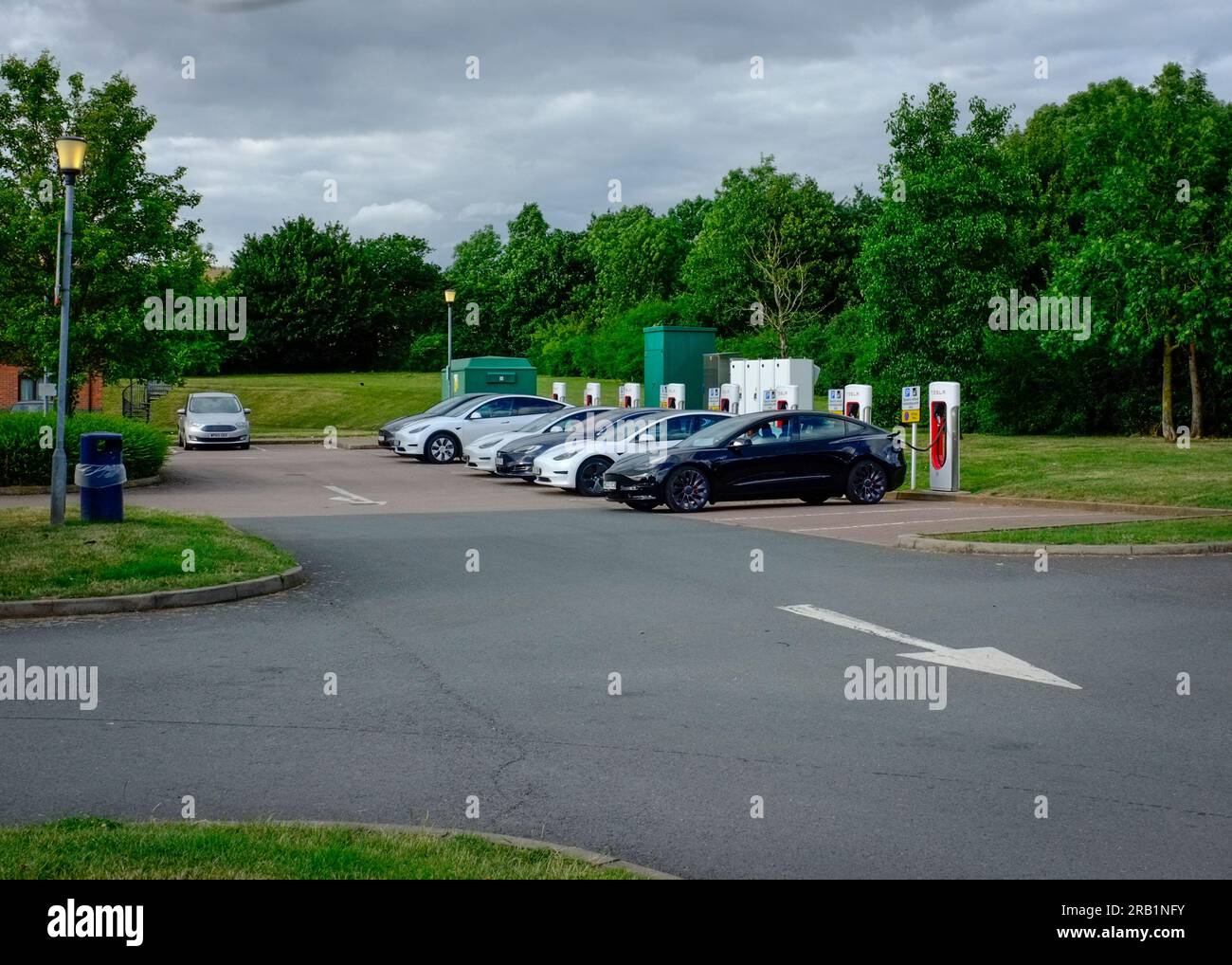 Tesla cars parked at a motorway service station at the Tesla charging ...