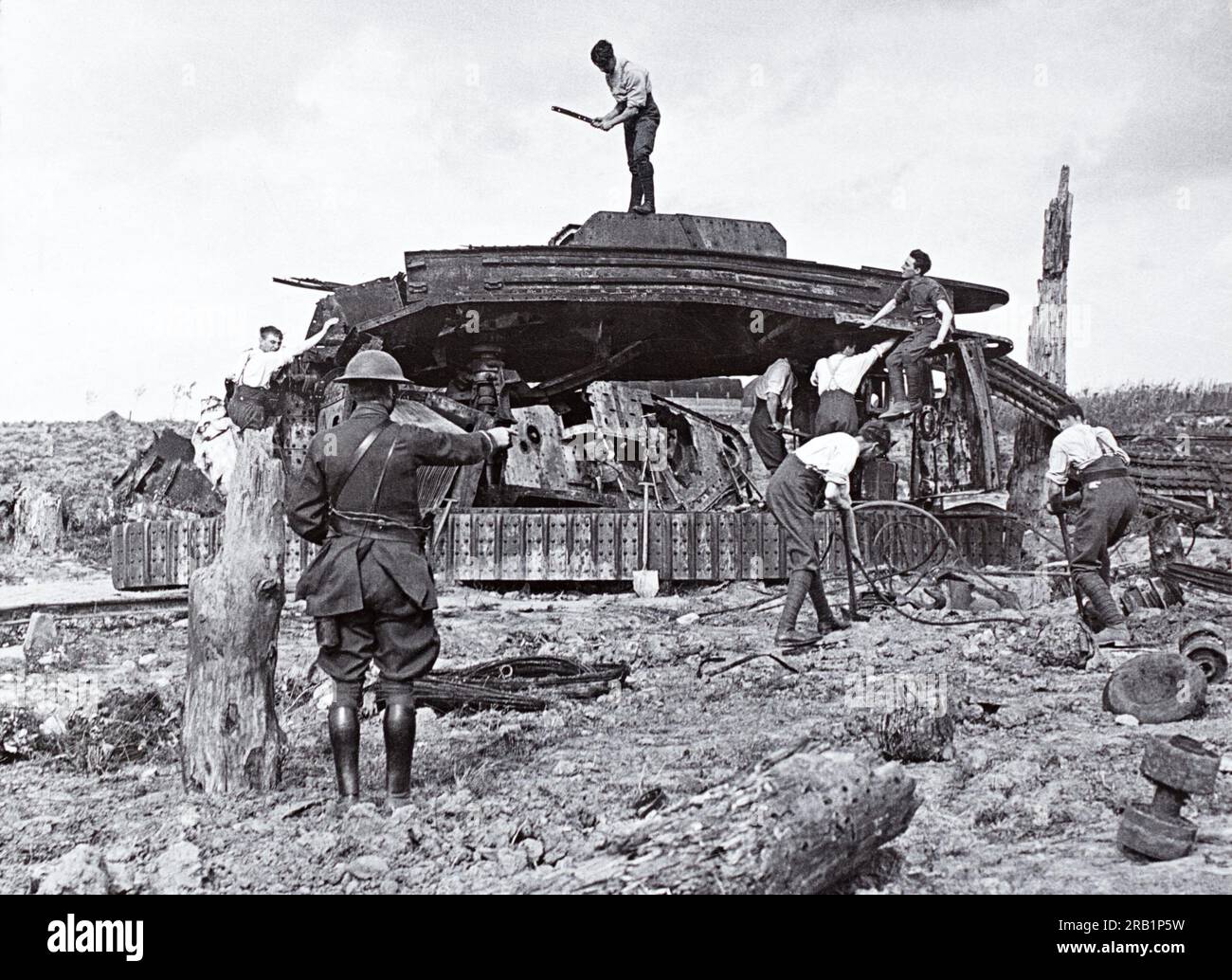 Sappers removing a derelict tank near Peronne on the Western Front ...