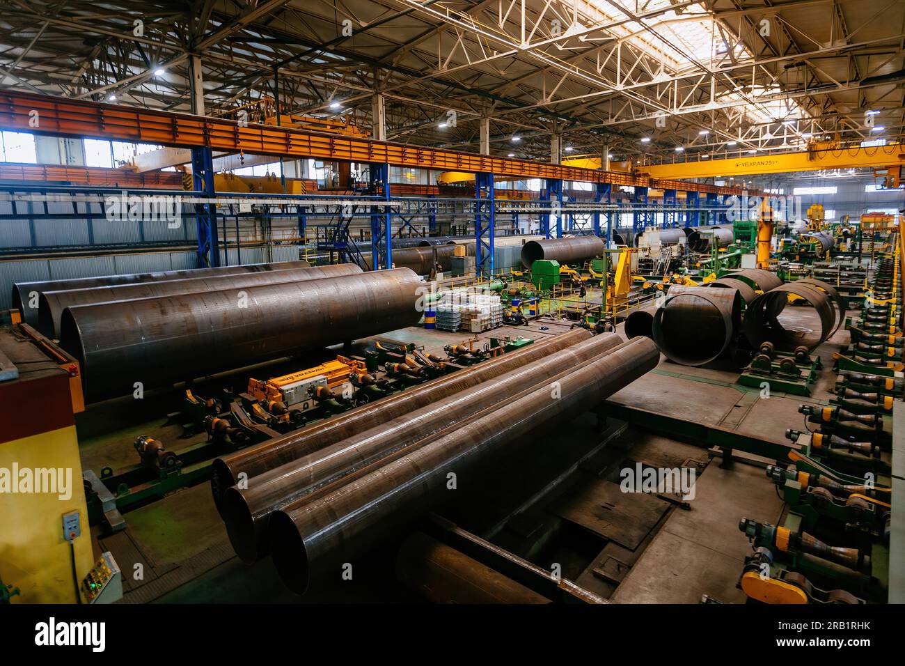 Modern seam pipe factory production line Stock Photo - Alamy