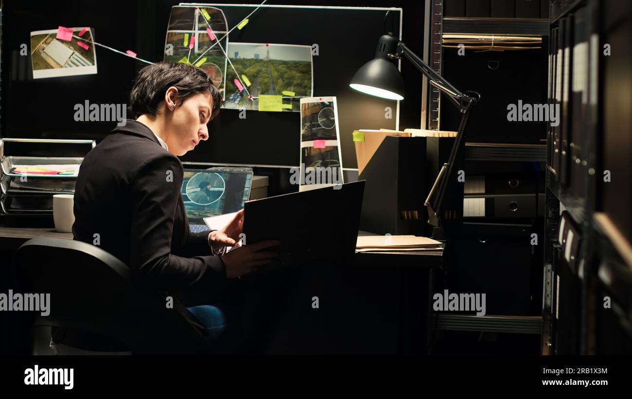 Detective gathering intelligence using surveillance photos and ...