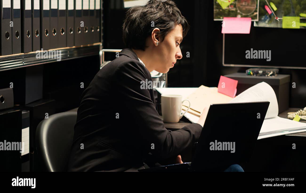 Woman officer reading witness statements hi-res stock photography and ...