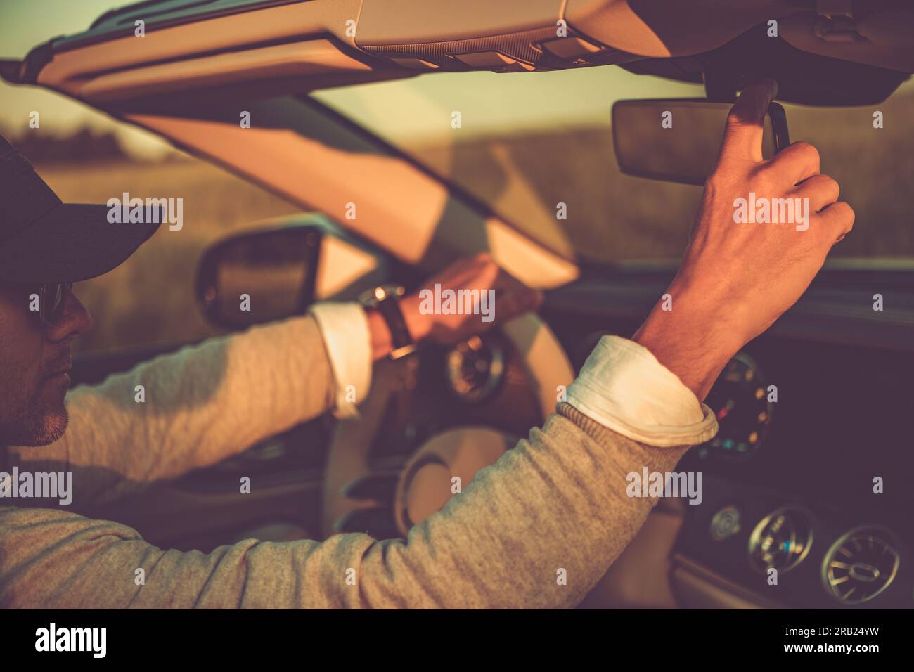 Closeup of Successful and Wealthy Middle Aged Man Adjusting Rear View ...