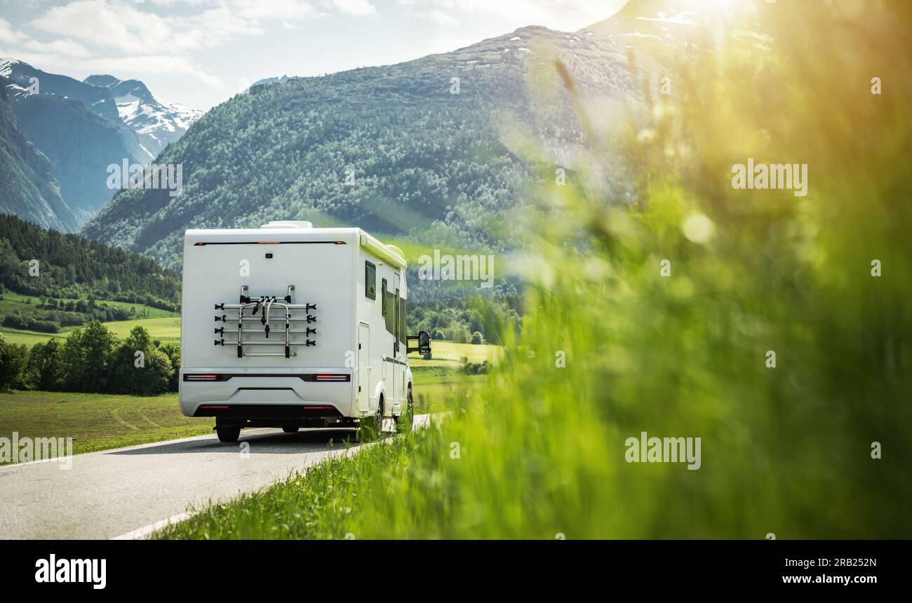 Back View of White Camper Van Driving Towards Beautiful Summer ...