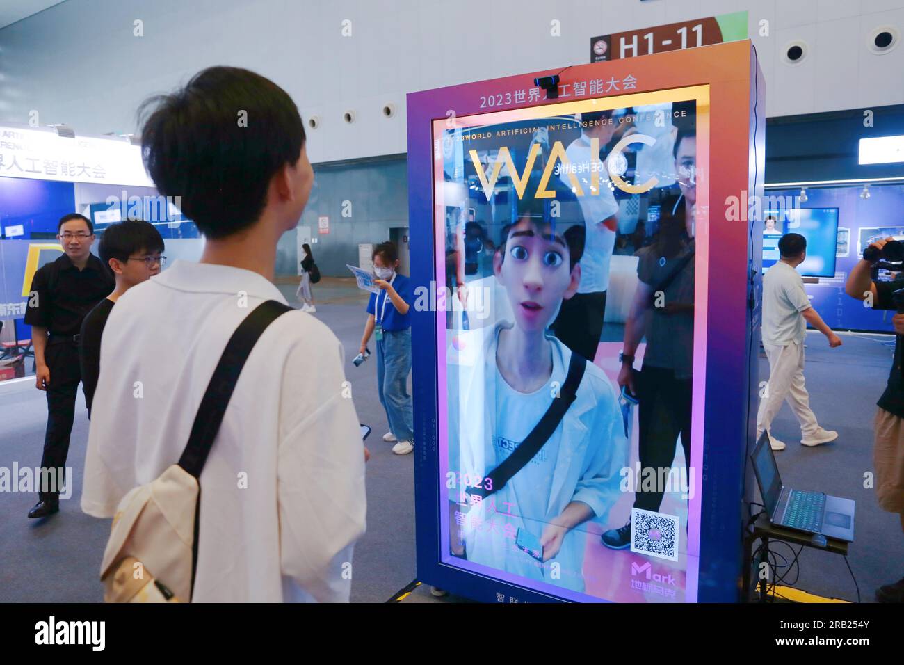 SHANGHAI, CHINA - JULY 6, 2023 - A viewer experiences a smart mirror at the 2023 WAIC in ...