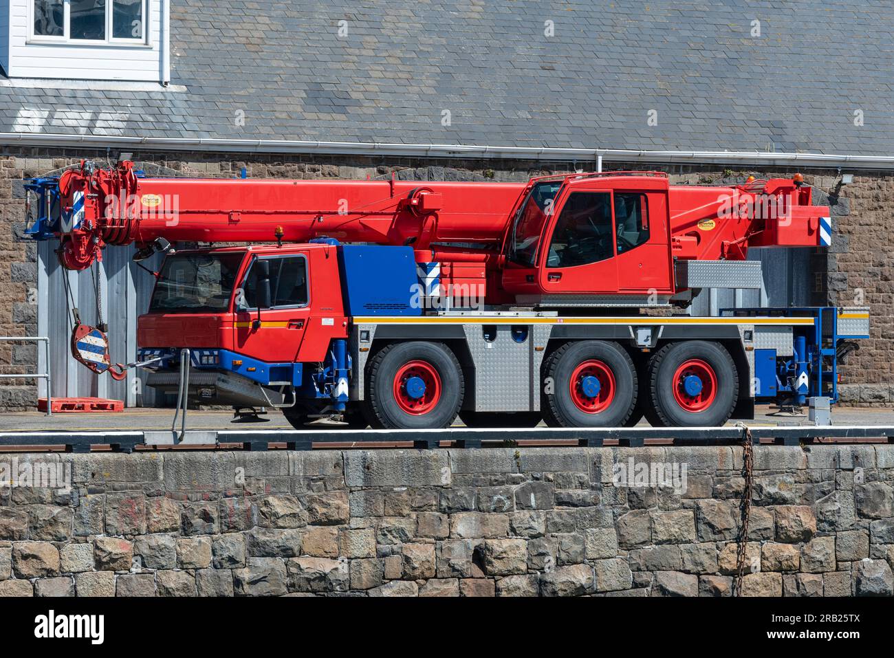 St Peters Port, Guernsey, Channel Islands. 11 June 2023. A red and blue painted all terrain ...