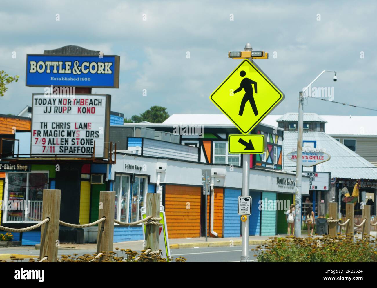 Dewey Beach, Delaware, U.S - July 4, 2023 - A yellow crossing line with blinking lights on the ...