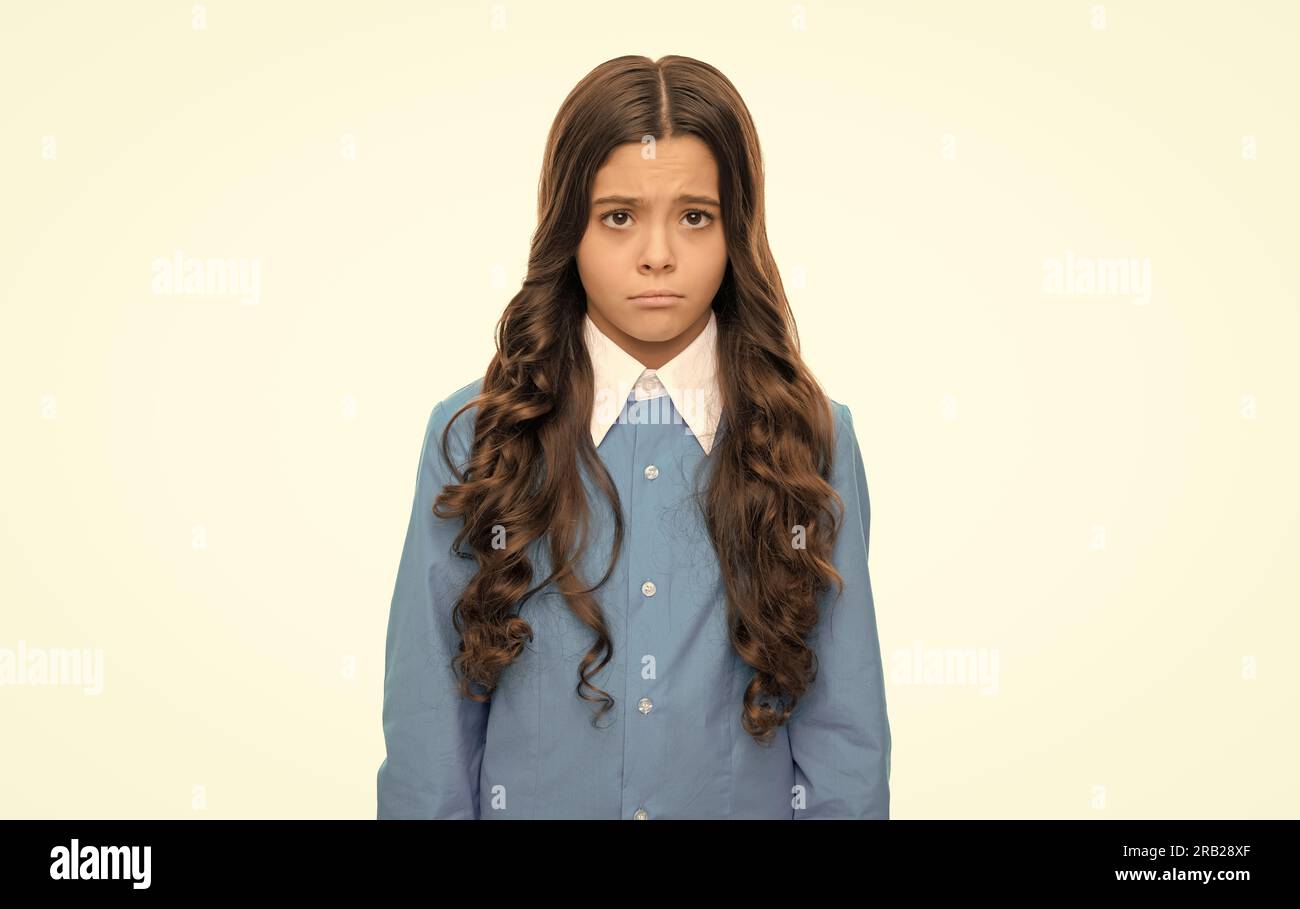 sad kid portrait has long curly hair isolated on white, emotions Stock ...