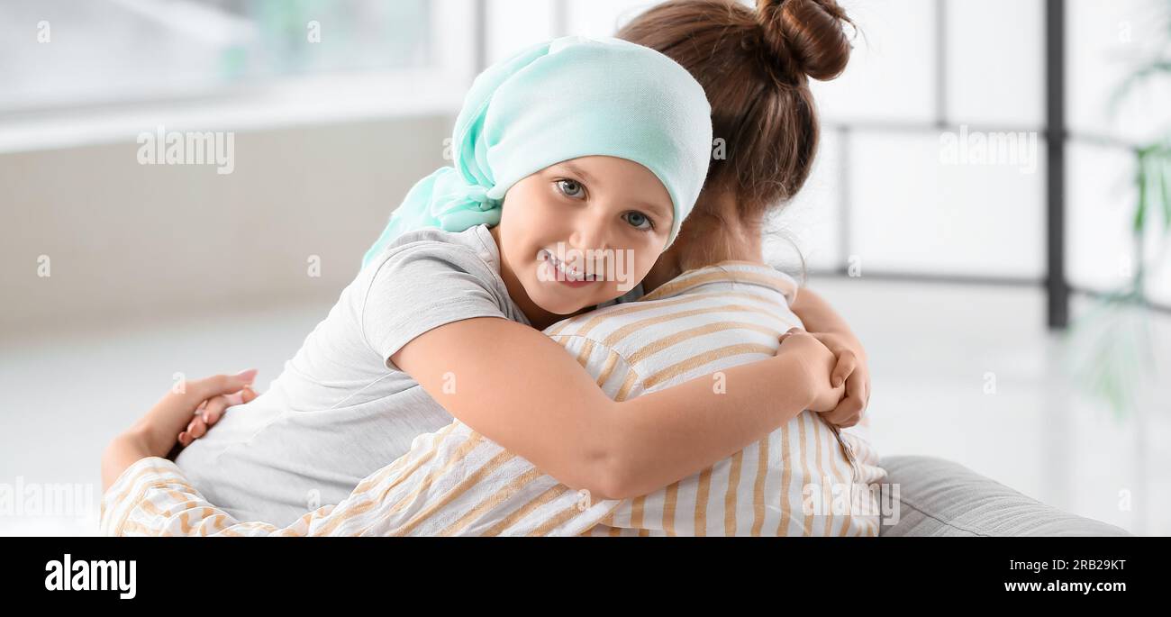 Little girl after chemotherapy with her mother at home Stock Photo - Alamy