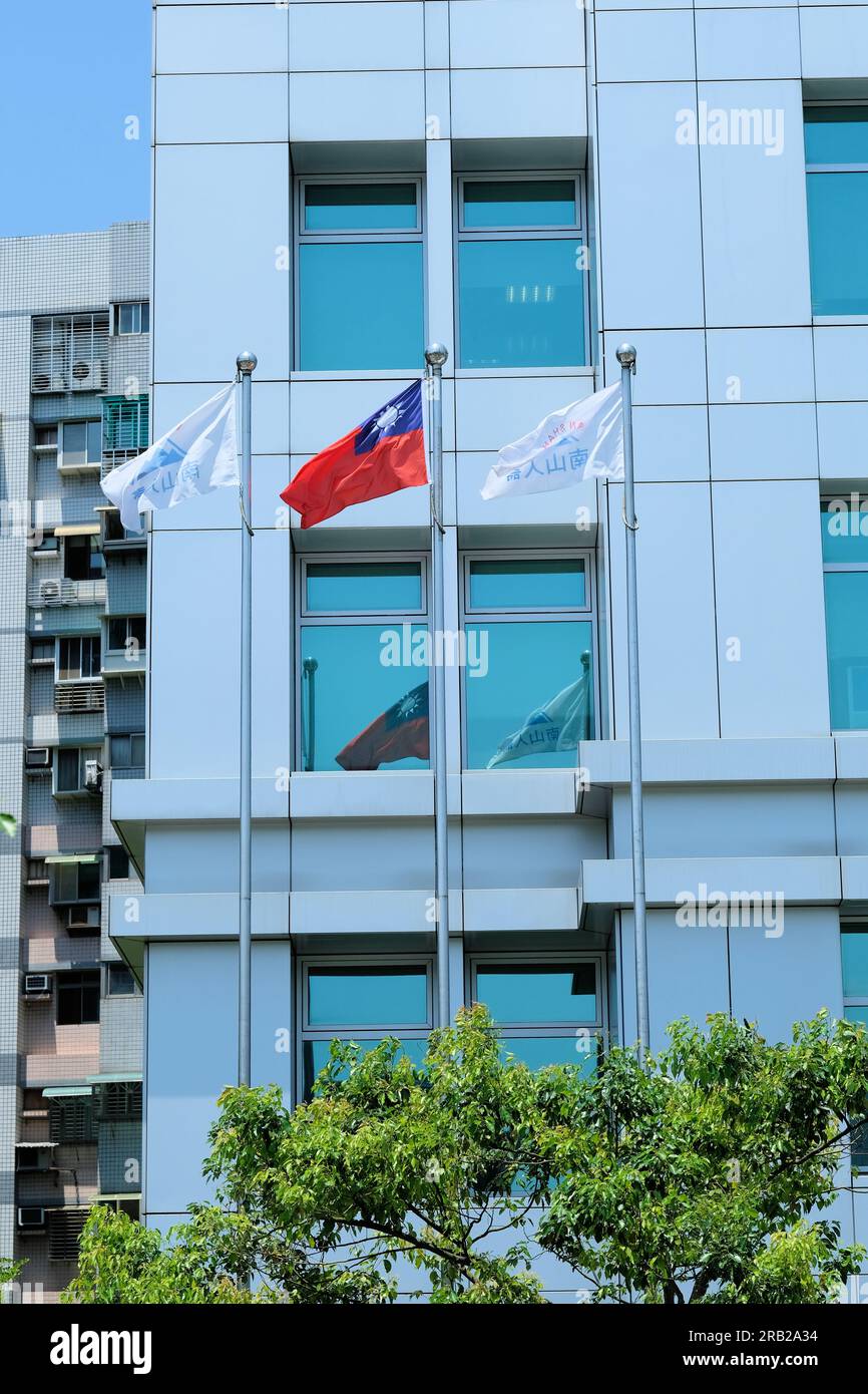 Taiwanese and Nan Shan corporate flags outside the Nan Shan Financial ...