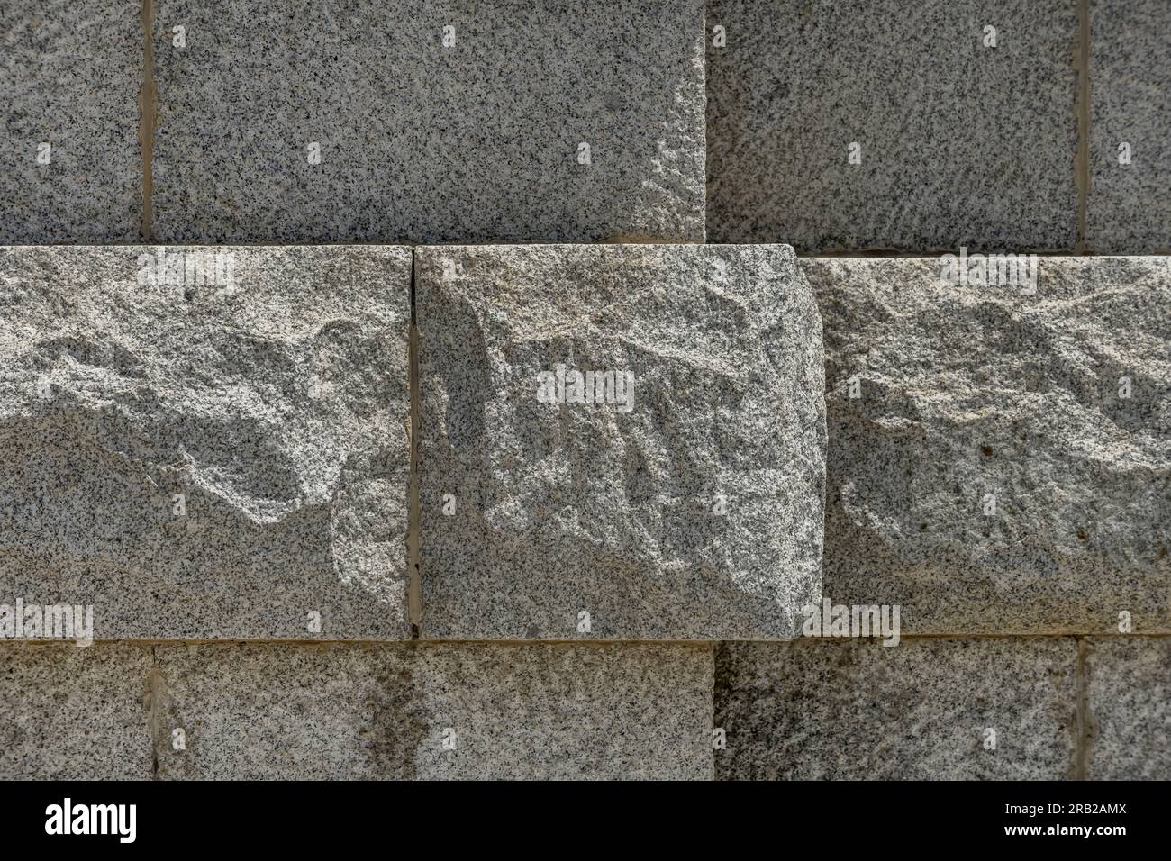 A wall of unpolished granite stones. vector stone texture background ...