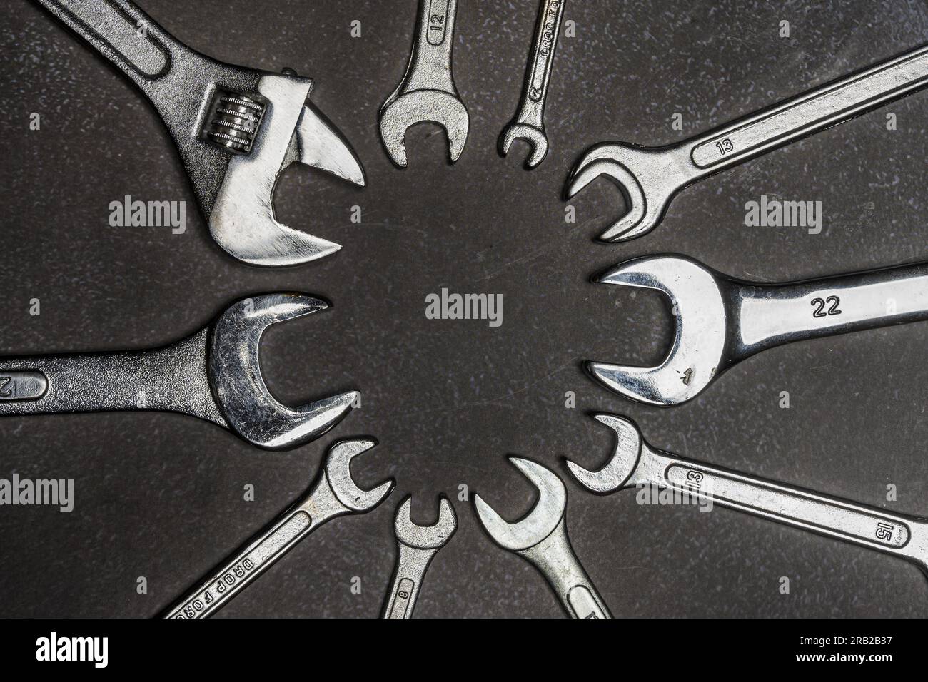 The heads of a spanner of different pitches and a small spanner Stock ...
