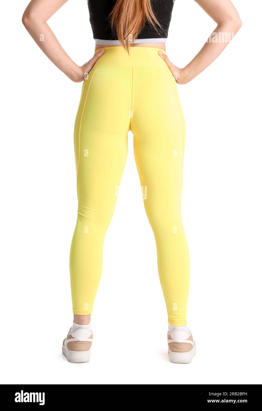 Sporty young woman in leggings on white background, back view Stock ...