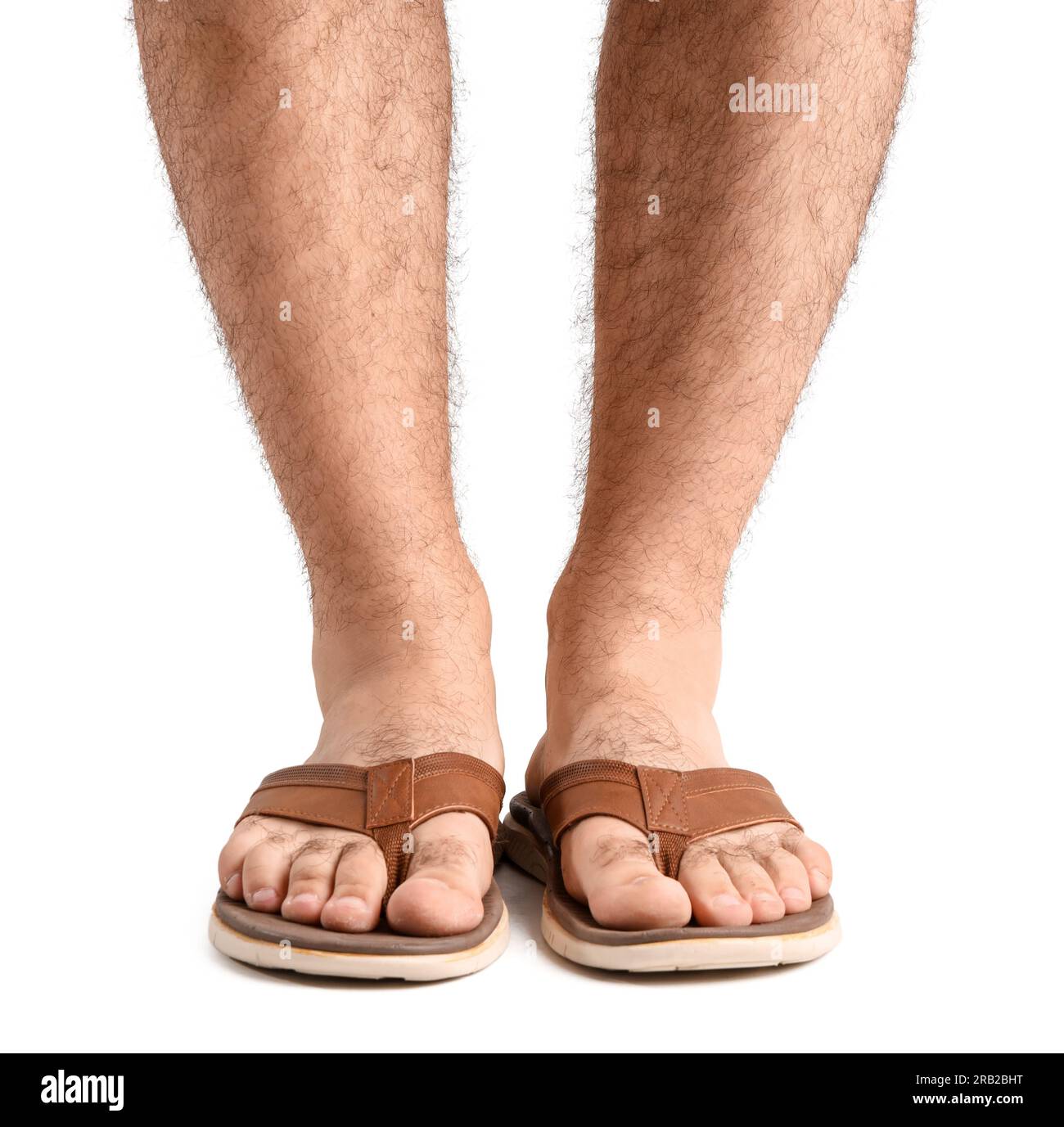 Male legs in flip-flops on white background Stock Photo - Alamy