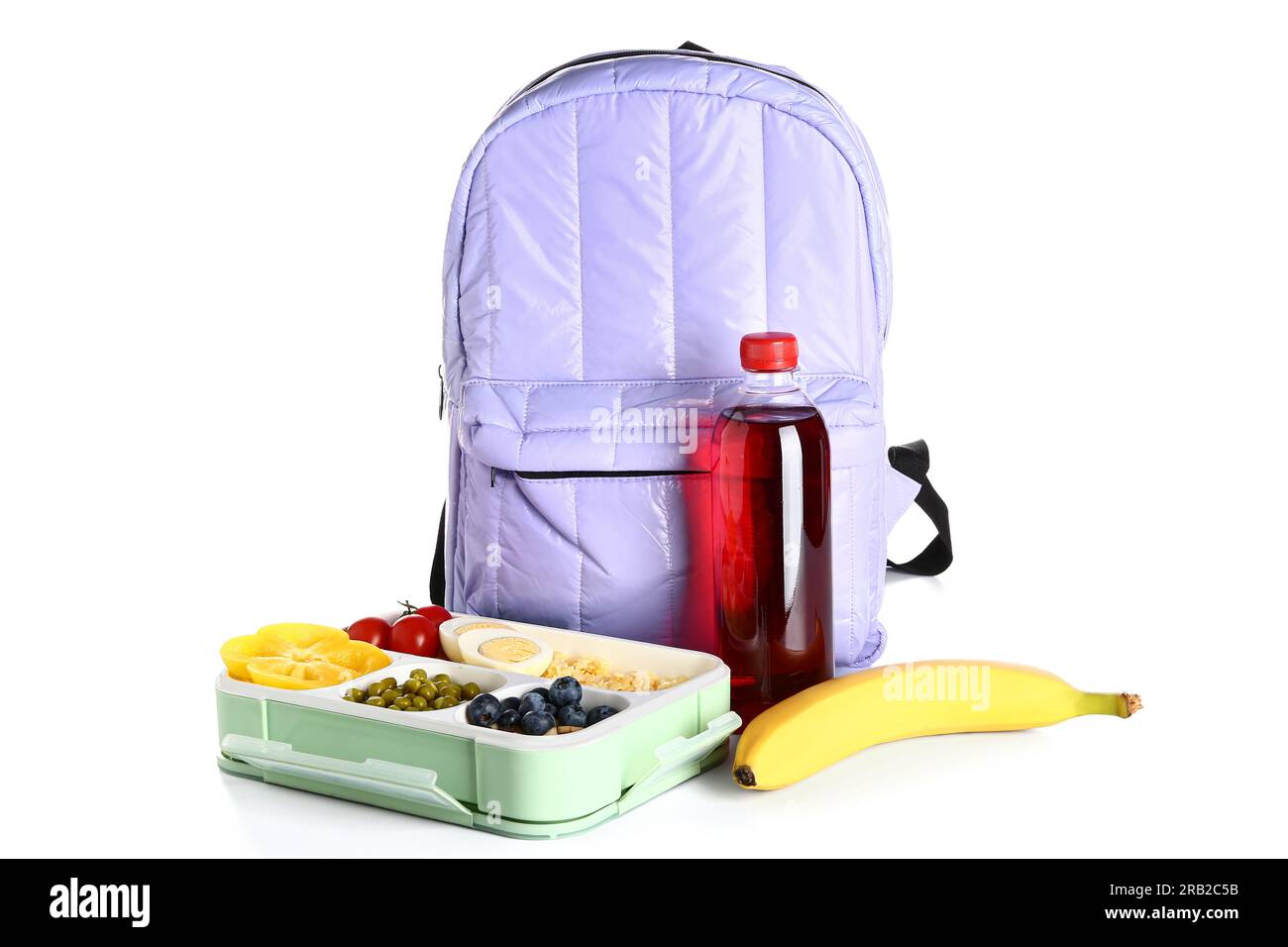Backpack, drink and lunchbox with tasty food isolated on white ...