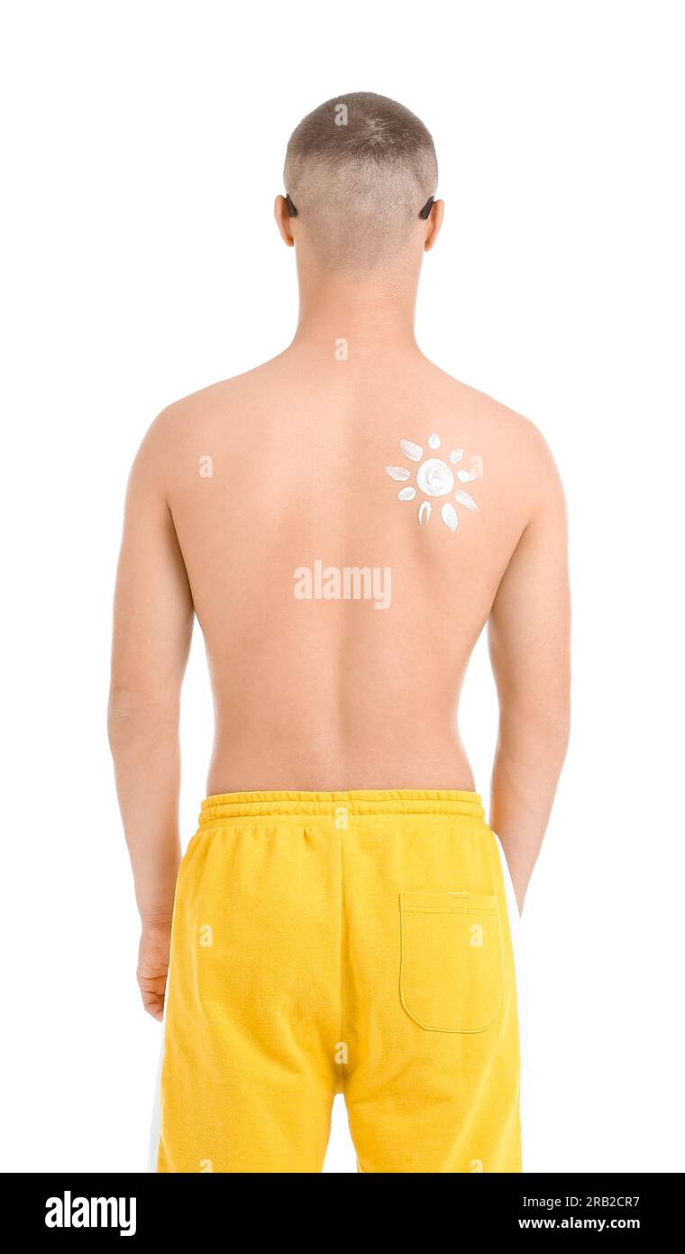 Young man with sun made of protection cream on his body against white ...