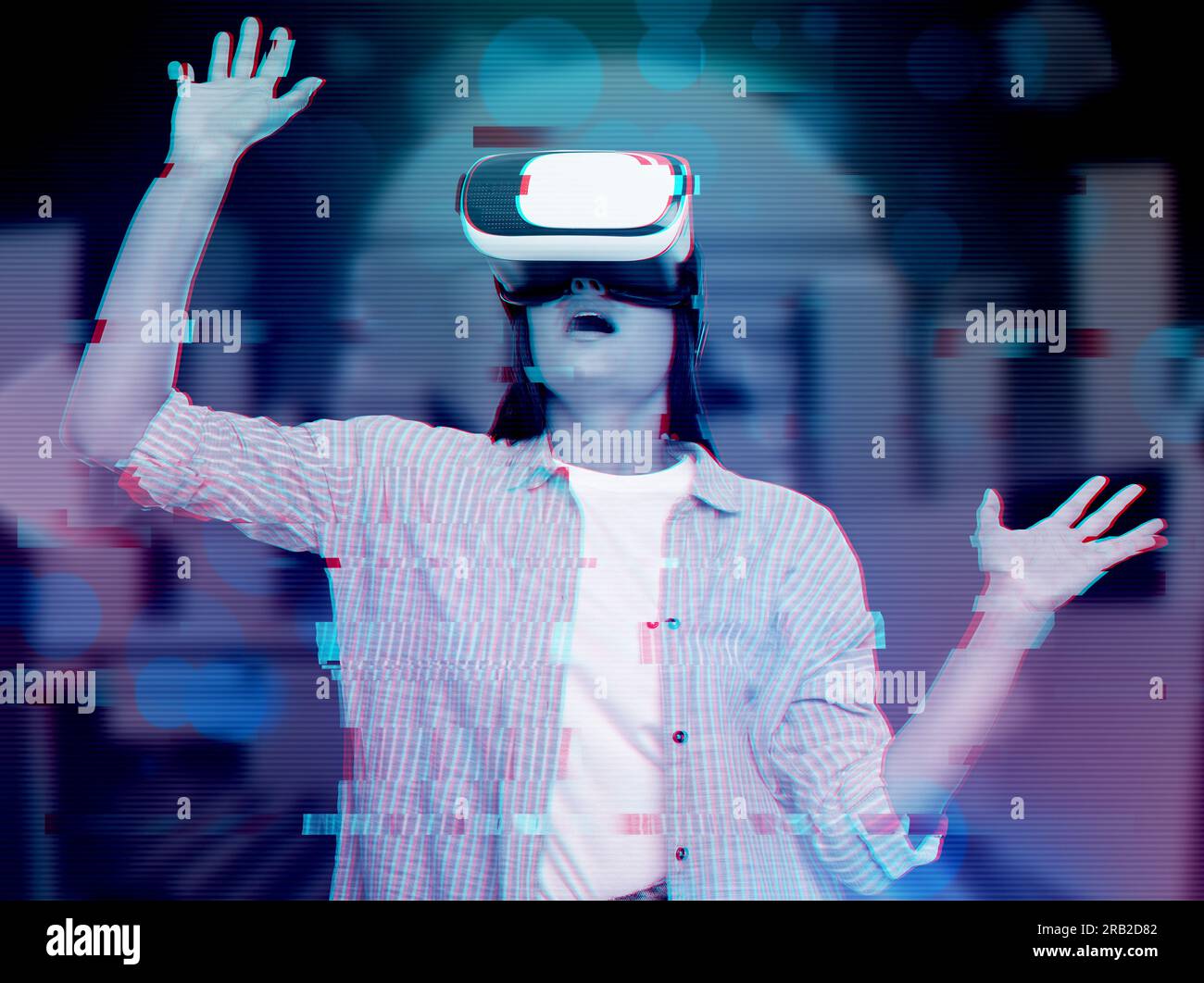 Metaverse. Woman in cyber city during simulated experience using ...