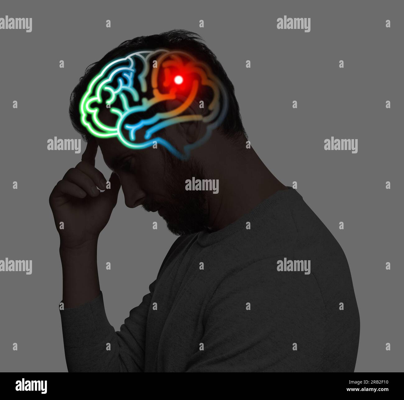 Amnesia. Thoughtful man with illustration of brain on grey background ...