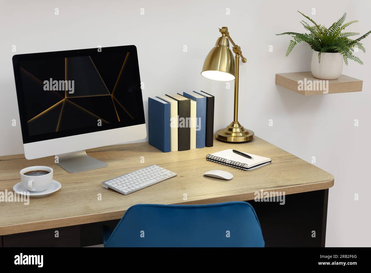 Cozy workspace with computer on wooden desk at home Stock Photo - Alamy
