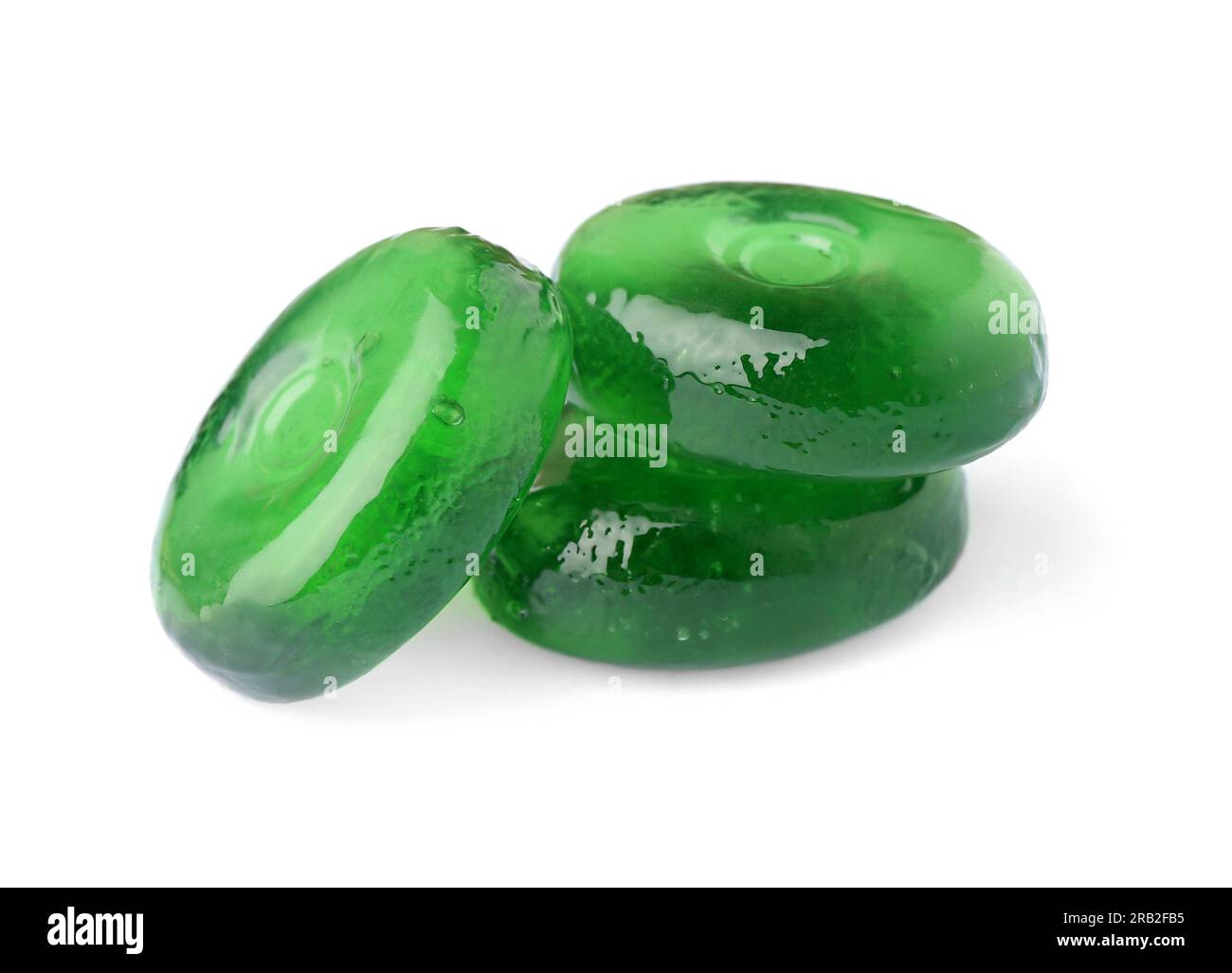 Green cough drops isolated on white. Sore throat treatment Stock Photo ...