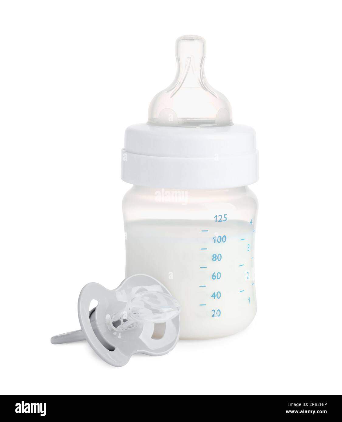 Bottle with milk and baby pacifier on white background Stock Photo - Alamy