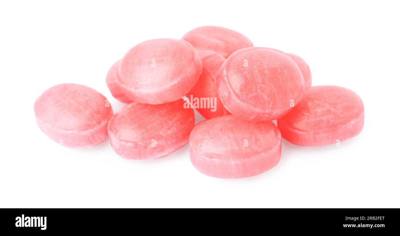 Many pink cough drops on white background Stock Photo - Alamy