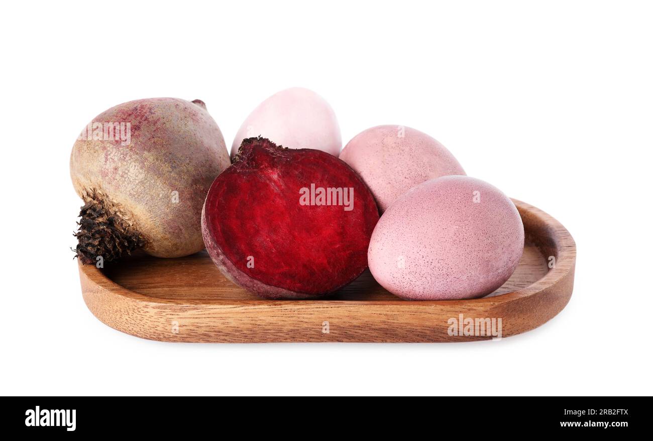 Colorful Easter eggs painted with natural dye and beets on white ...