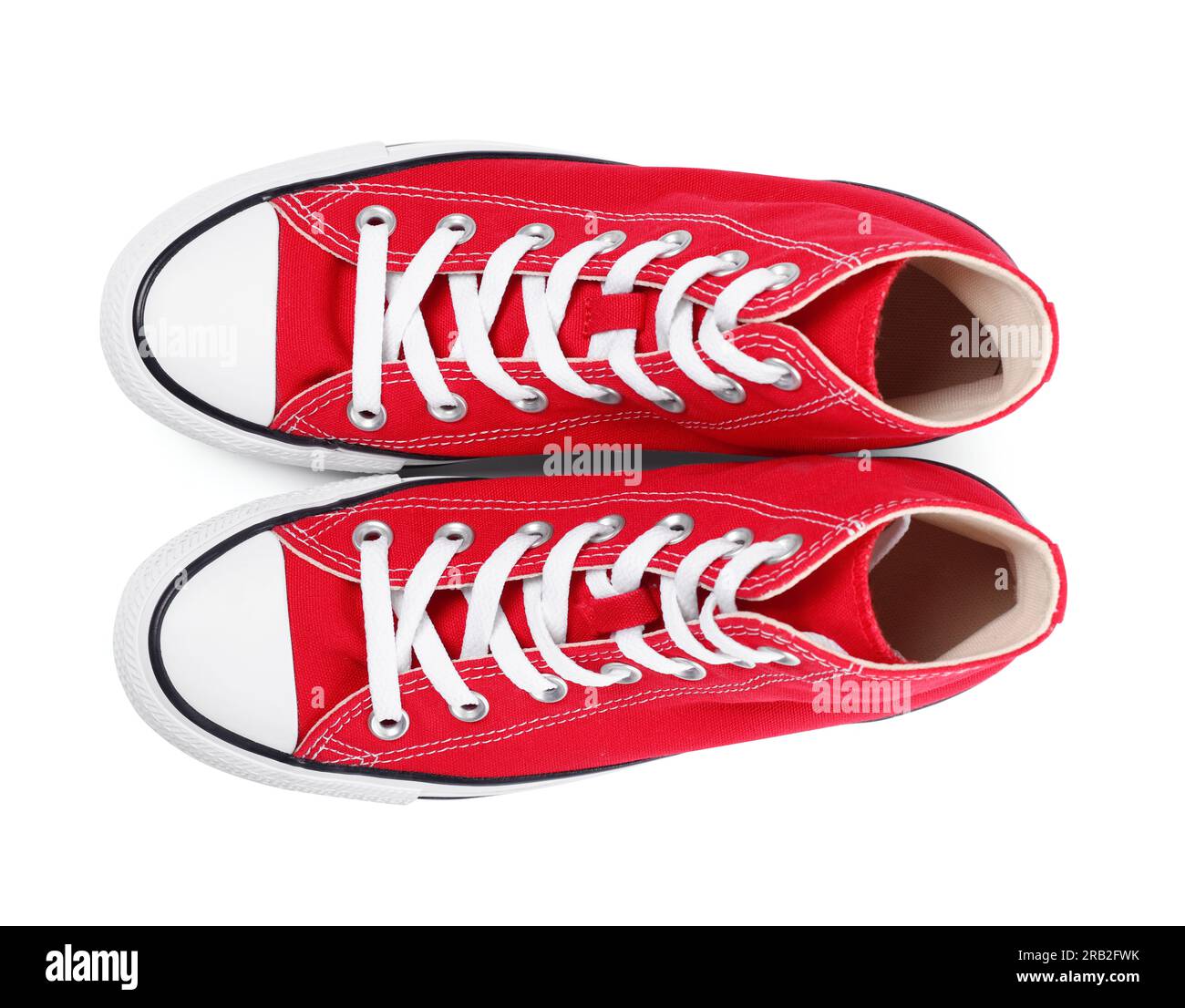 Pair of new red stylish plimsolls on white background, top view Stock ...