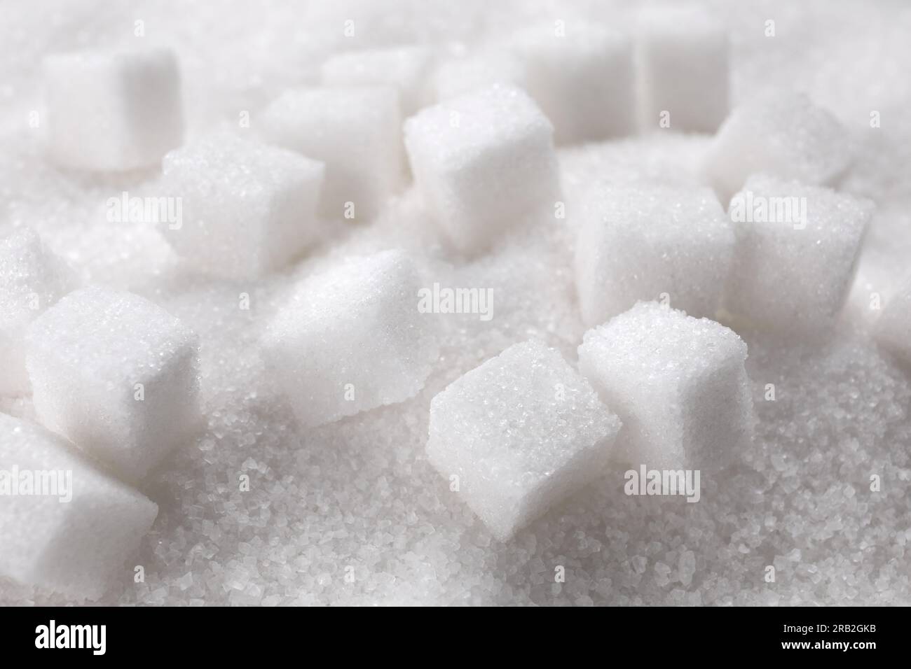 Different types of white sugar as background, closeup Stock Photo - Alamy