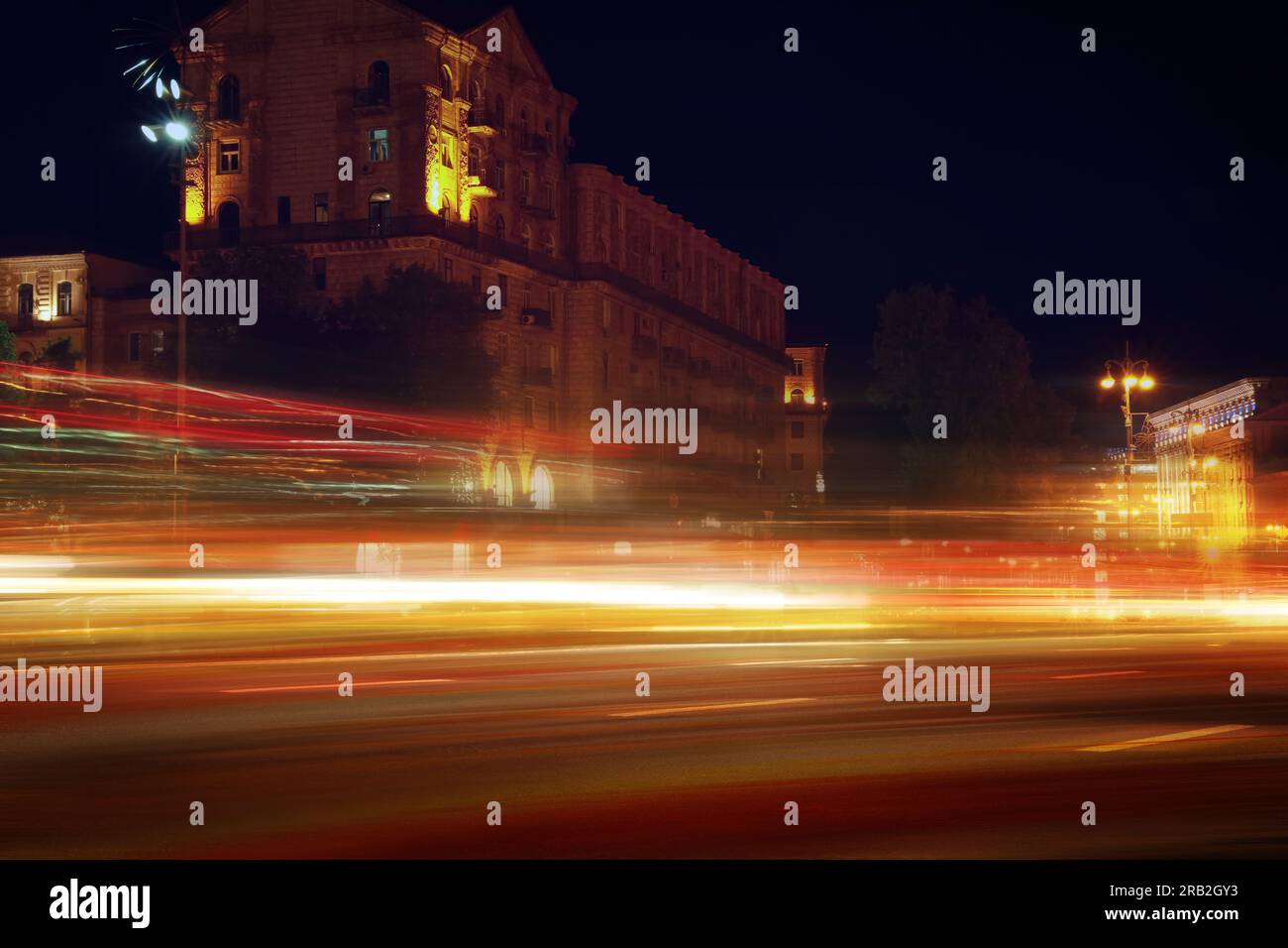 Road traffic, motion blur effect. View of night cityscape with car ...