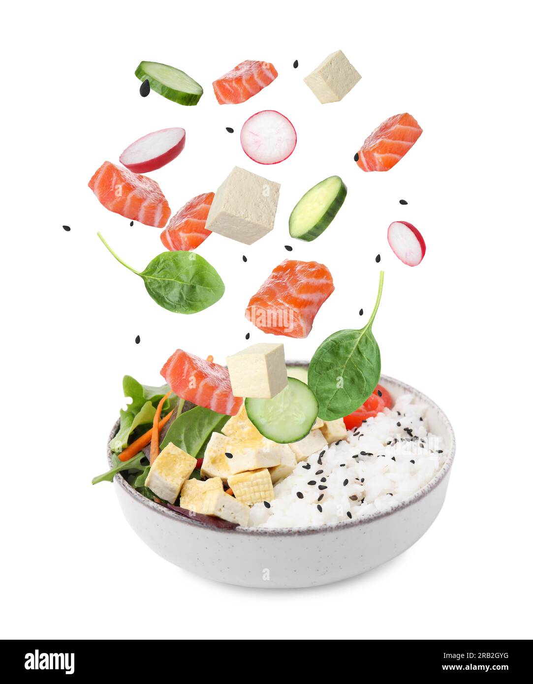 Poke recipe. Different ingredients falling into bowl on white ...