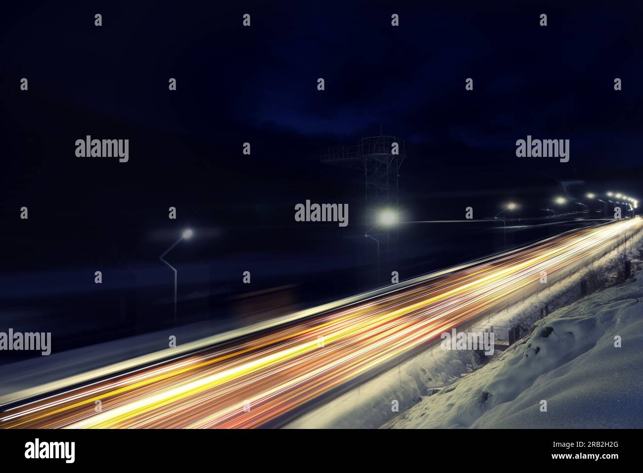 Road traffic, motion blur effect. View of car light trails at night ...