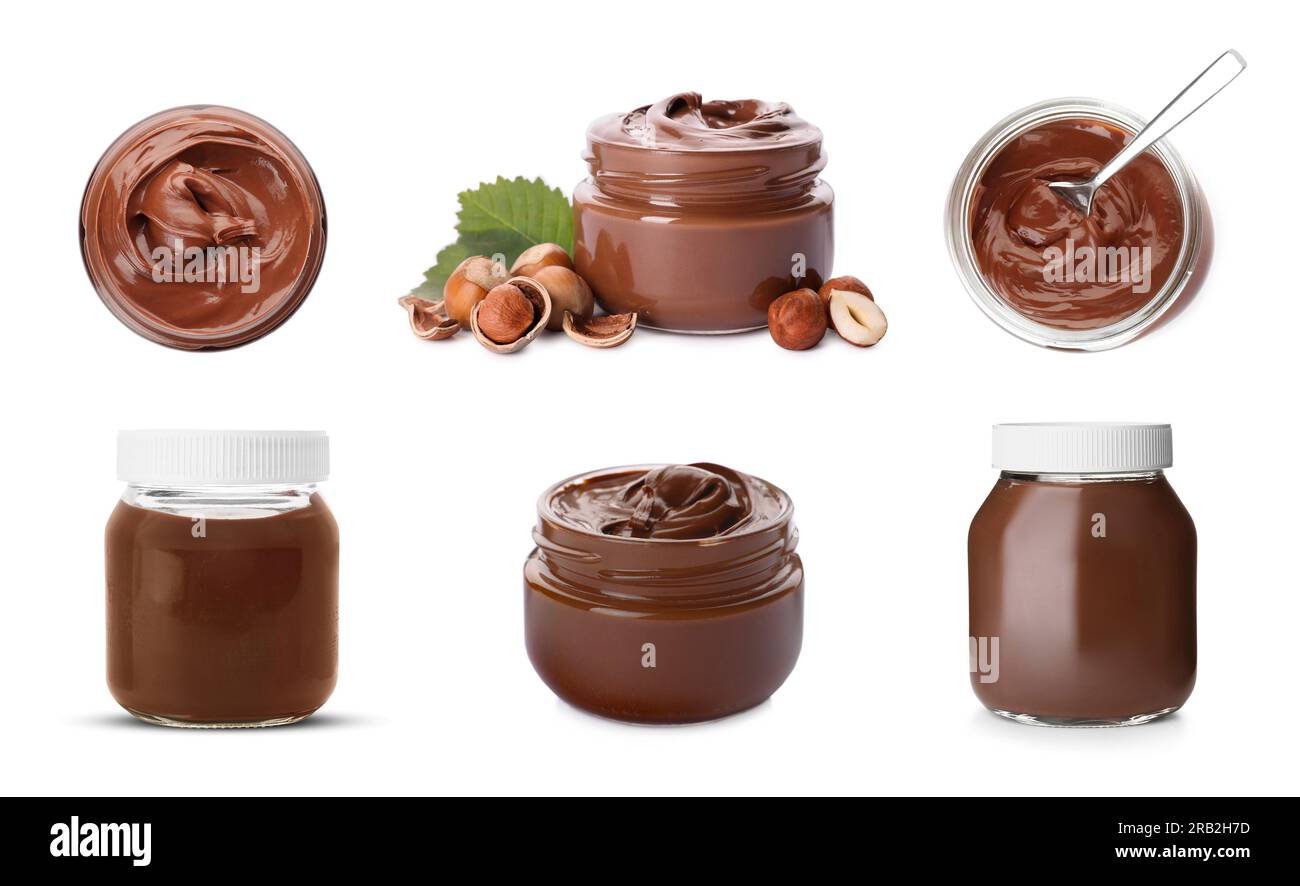 Yummy chocolate paste in jars and hazelnuts on white background ...