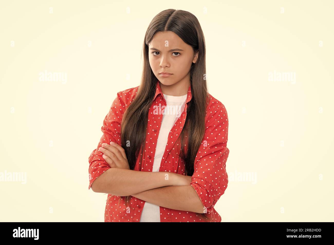 Angry teenager girl, upset and unhappy negative emotion. Studio ...