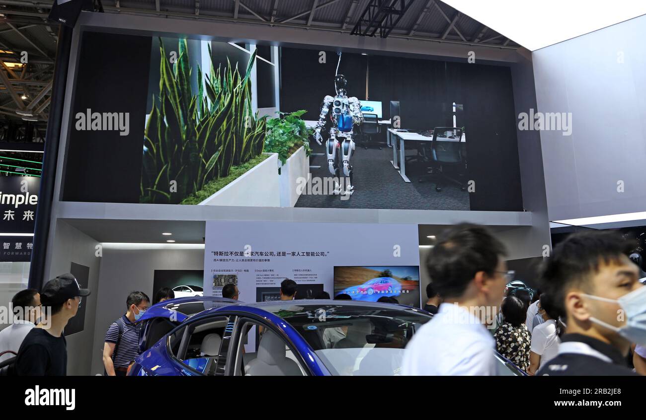 SHANGHAI, CHINA - JULY 6, 2023 - Visitors visit the Tesla booth at the ...