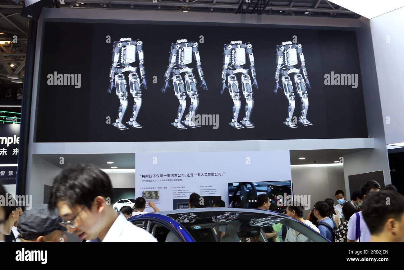 SHANGHAI, CHINA - JULY 6, 2023 - Visitors view the Tesla Bot humanoid ...