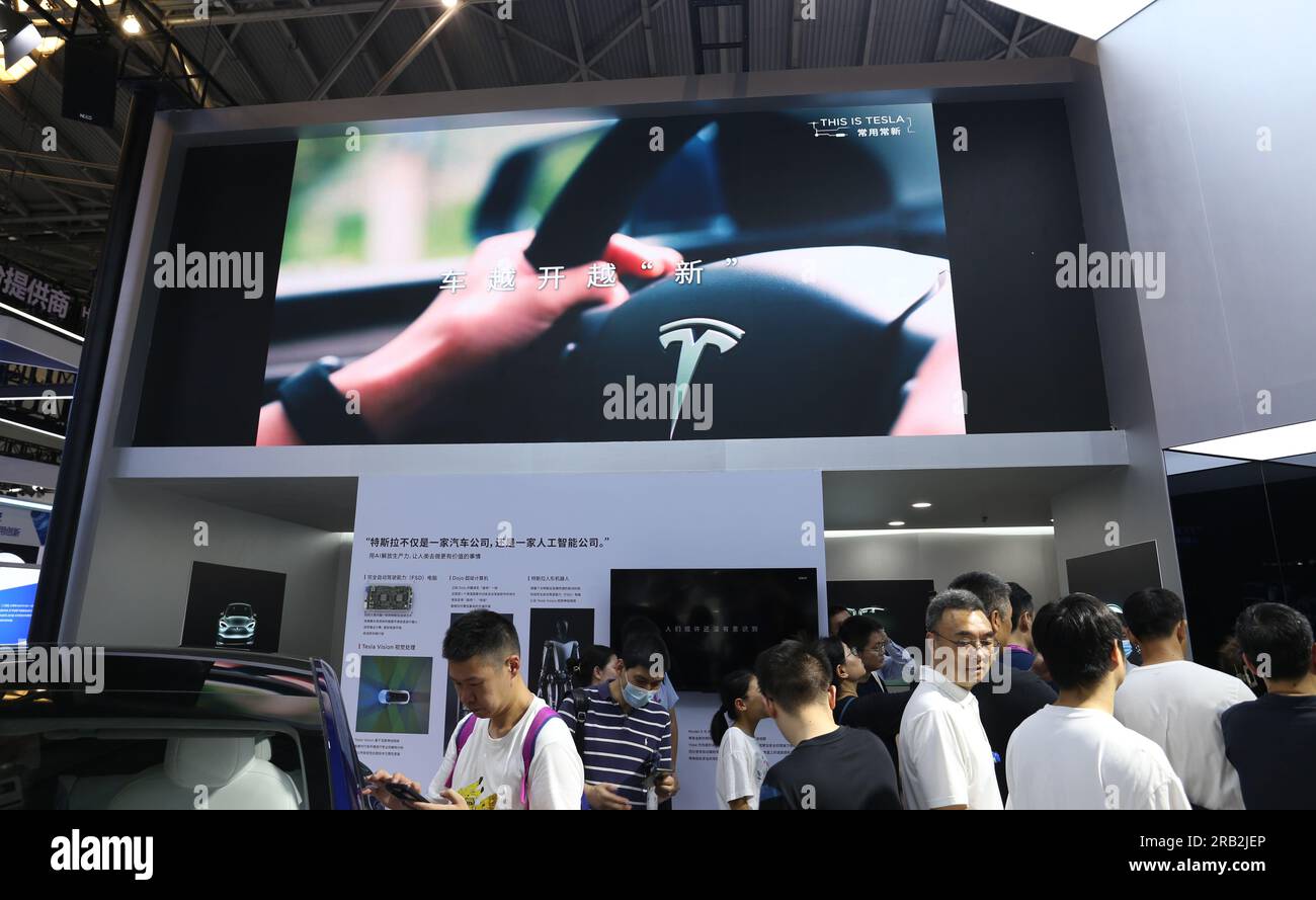 SHANGHAI, CHINA - JULY 6, 2023 - Visitors visit the Tesla booth at the ...
