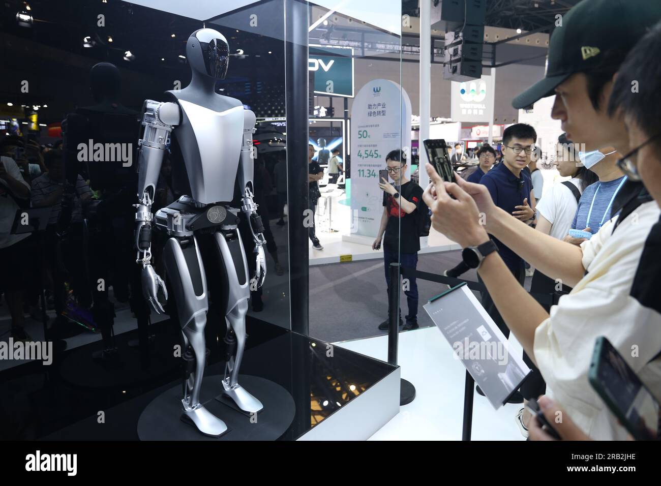 SHANGHAI, CHINA - JULY 6, 2023 - Visitors view the Tesla Bot humanoid ...