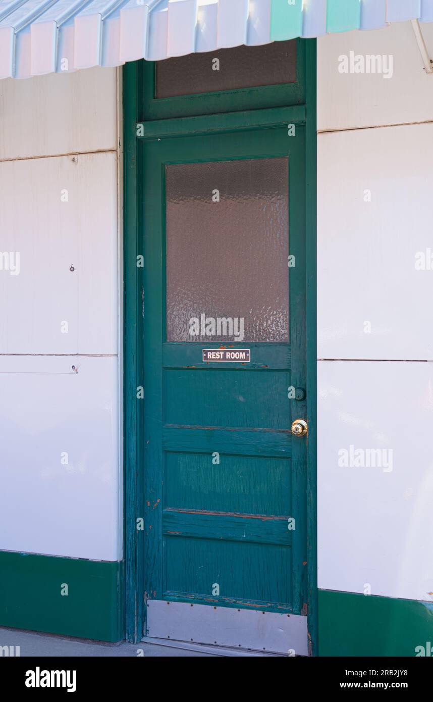 Green & white architecture on old vintage building shows outside ...