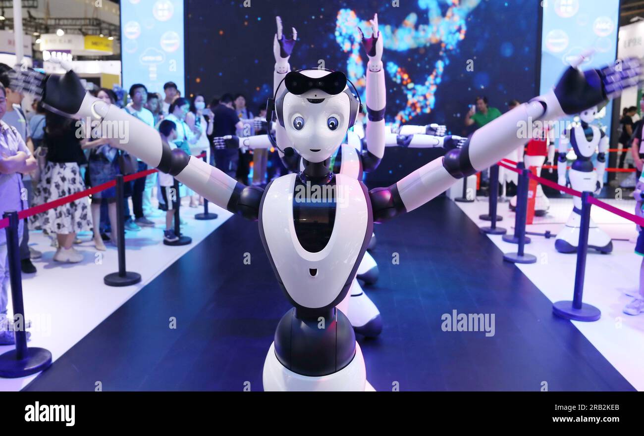 SHANGHAI, CHINA - JULY 6, 2023 - Human-like intelligent service robots perform a thousand-hand ...